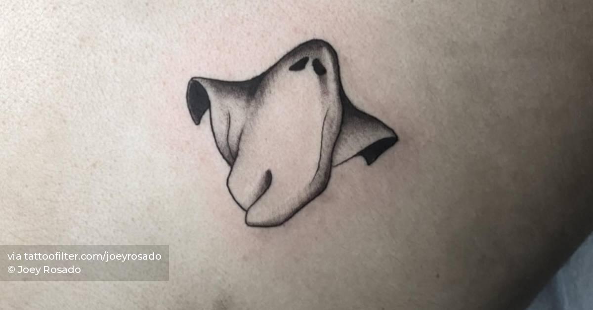 Ghost tattoo located on the back, illustrative style.