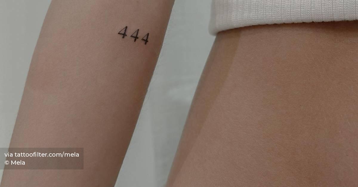 Tattoo of the number "444" located on the inner