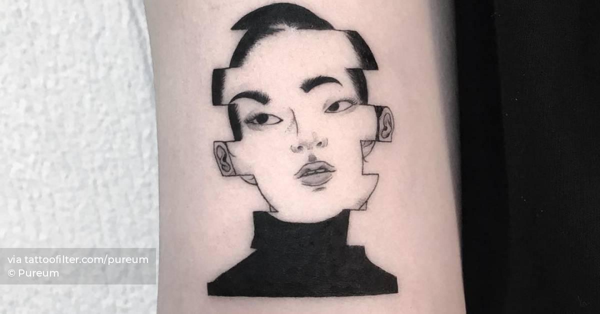 Women portrait tattoo located on the tricep.