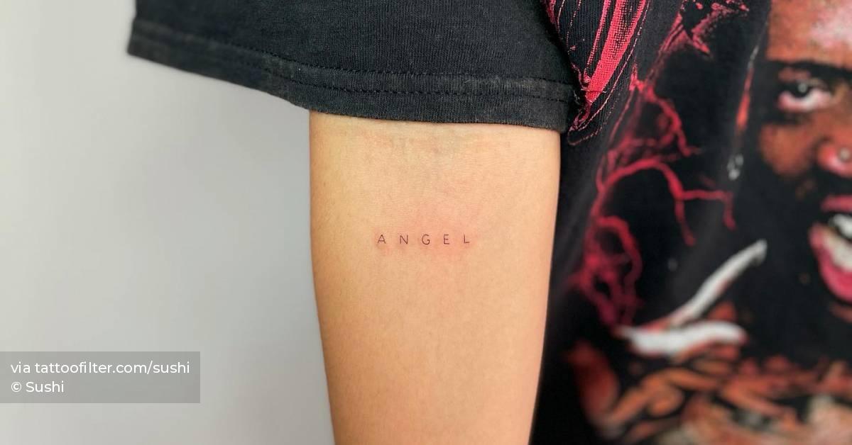 Tattoo of the word "angel" located on the inner