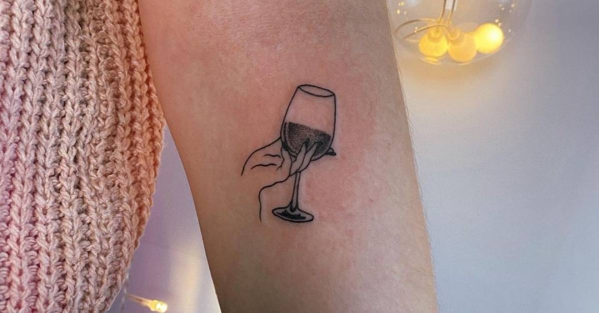 Wine Glass Tattoo Located On The Inner Forearm