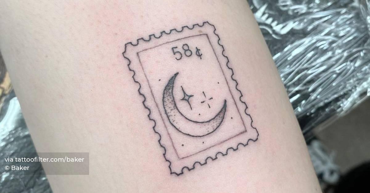 Crescent moon stamp tattooed on the tricep.