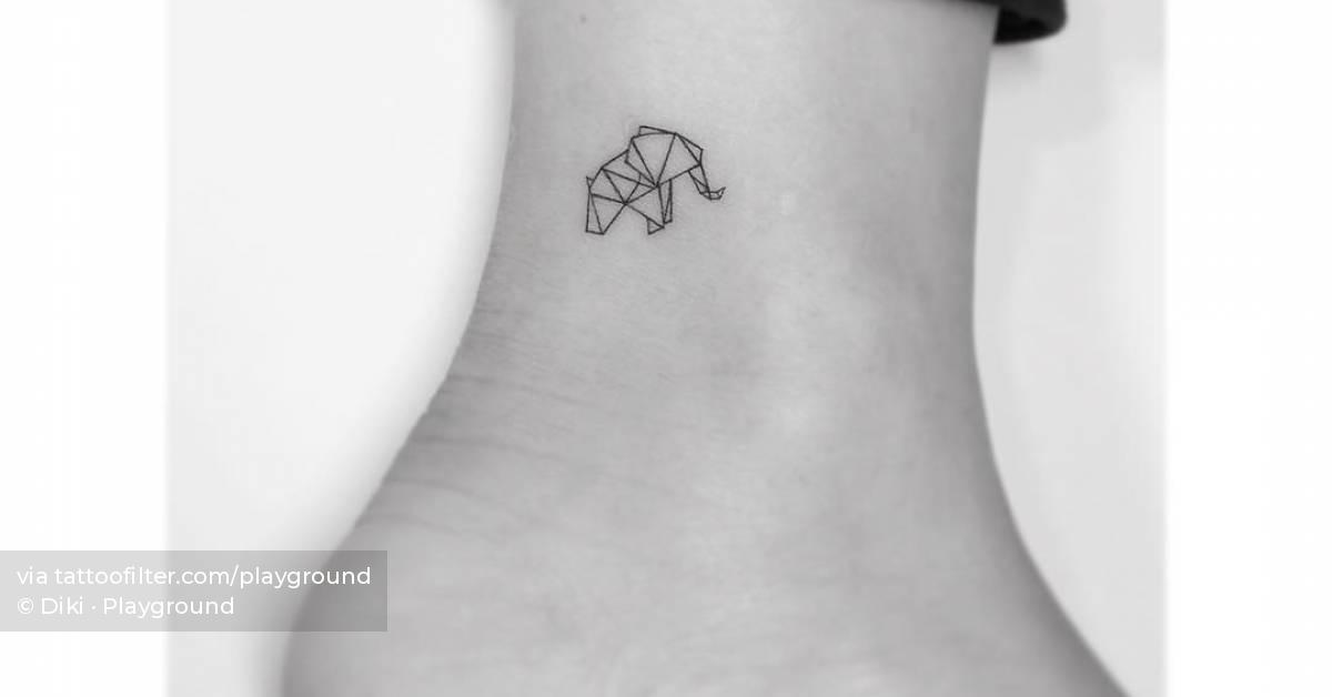 Fine line elephant origami tattoo located on the ankle.