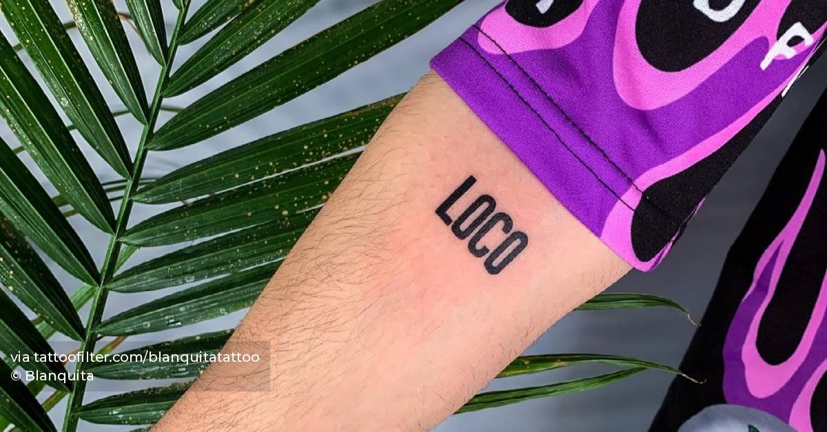 "Loco" lettering tattoo located on the inner forearm.