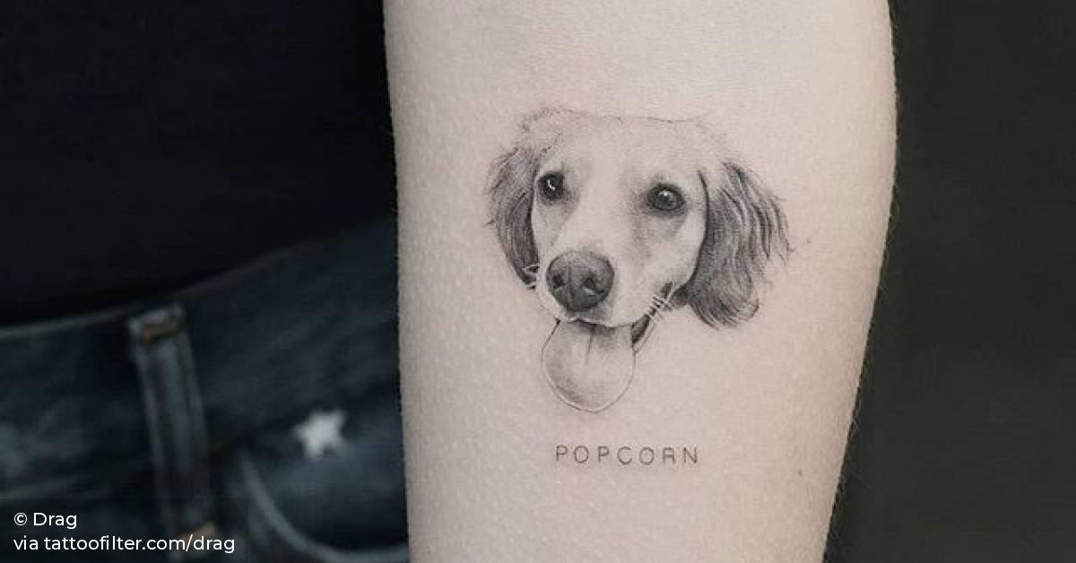 Cocker Spaniel portrait tattoo on the inner forearm