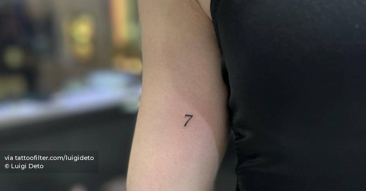 Tattoo of the number "7" done on the inner arm.