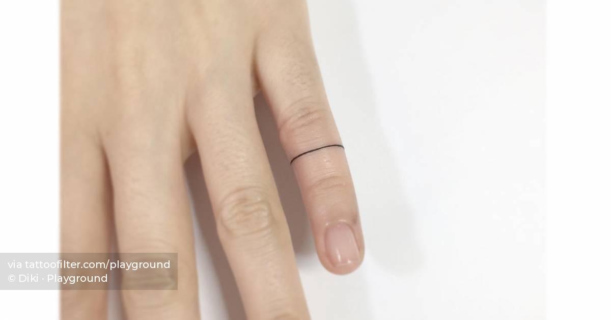 Minimalistic ring tattoo done in fine line.