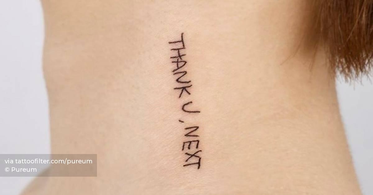 "Thank you, next" lettering tattoo located on the neck.