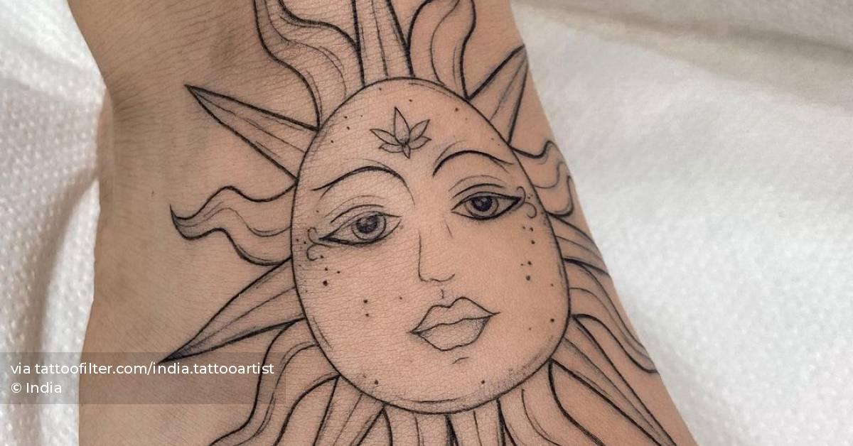 Sun tattoo on the foot.