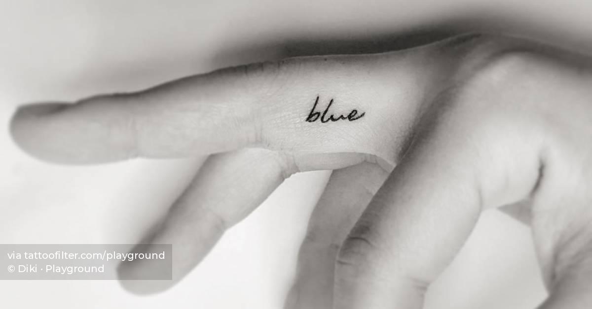 Tattoo of the word "blue" handwritten on the finger.
