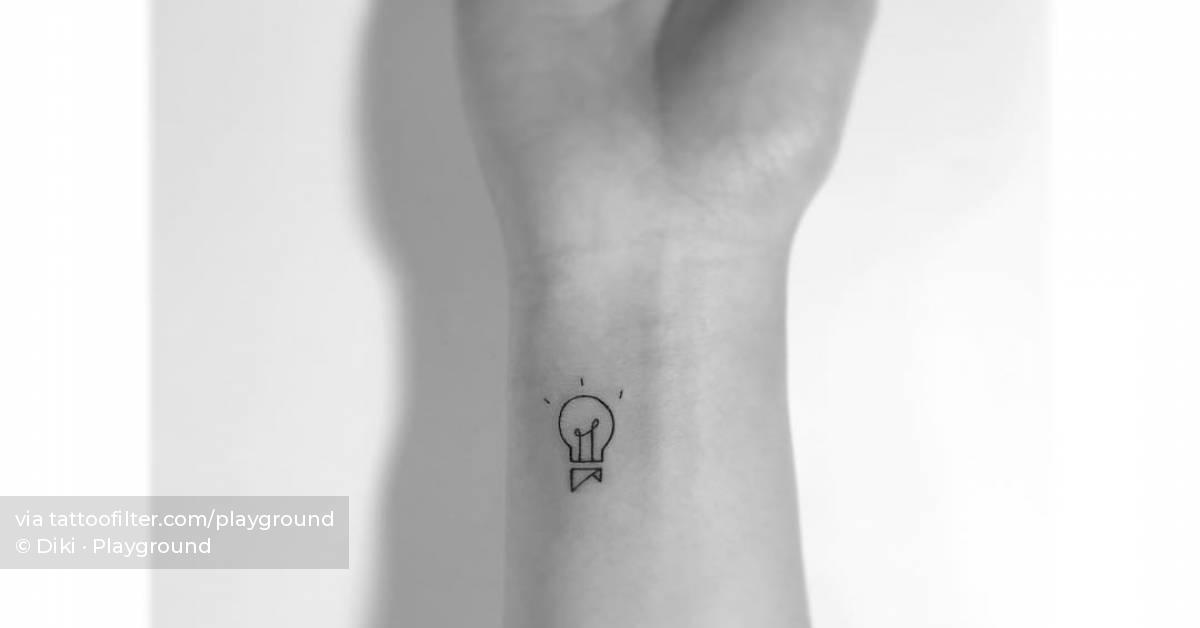 Minimalistic style light bulb tattoo done on the wrist.