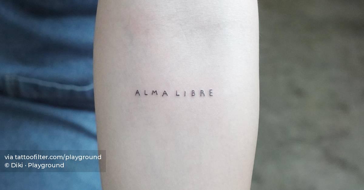 "Alma libre" lettering tattoo done on the inner
