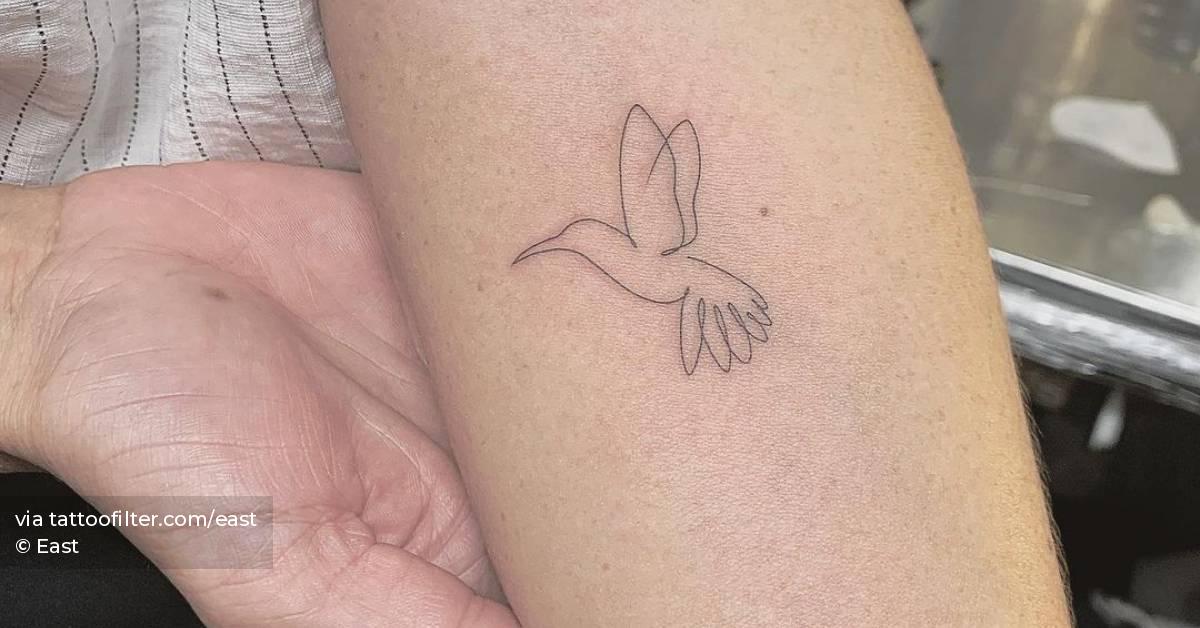 One line hummingbird tattoo located on the inner