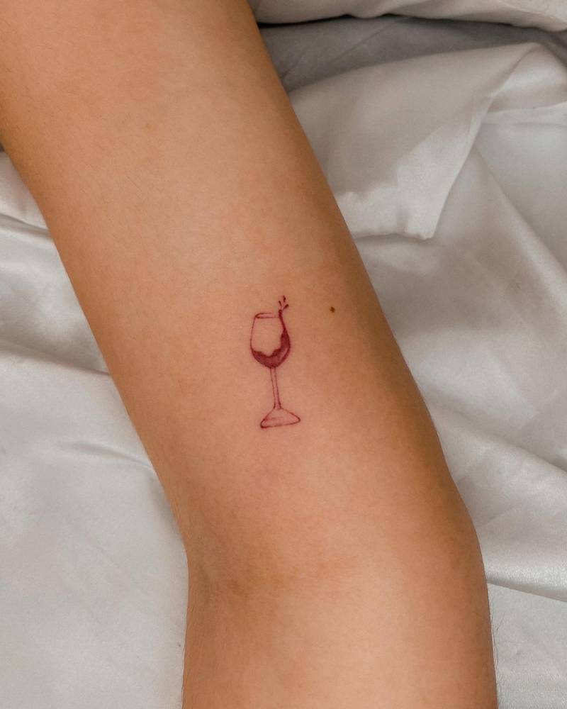 Minimalistic Wine Glass Tattoo Done In Red Ink Minimalistic Wine Glass Tattoo Done In Red Ink