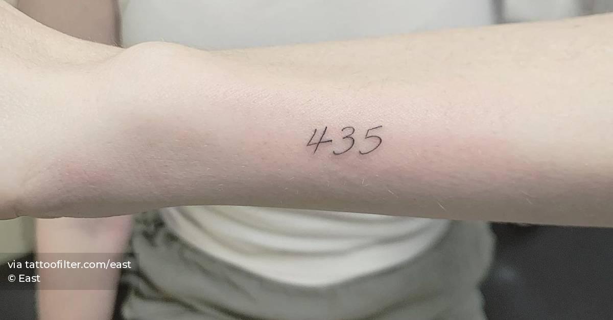Tattoo of the number "435" located on the wrist.