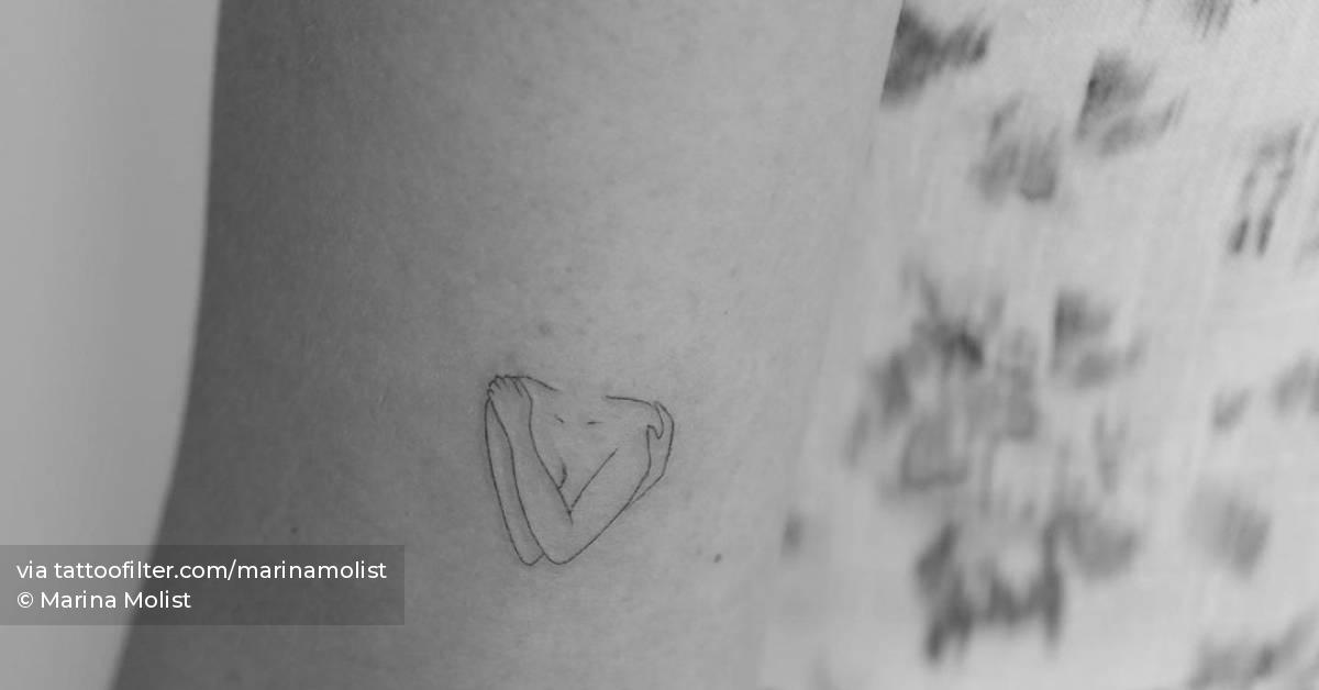 Fine line self love tattoo done on the tricep.