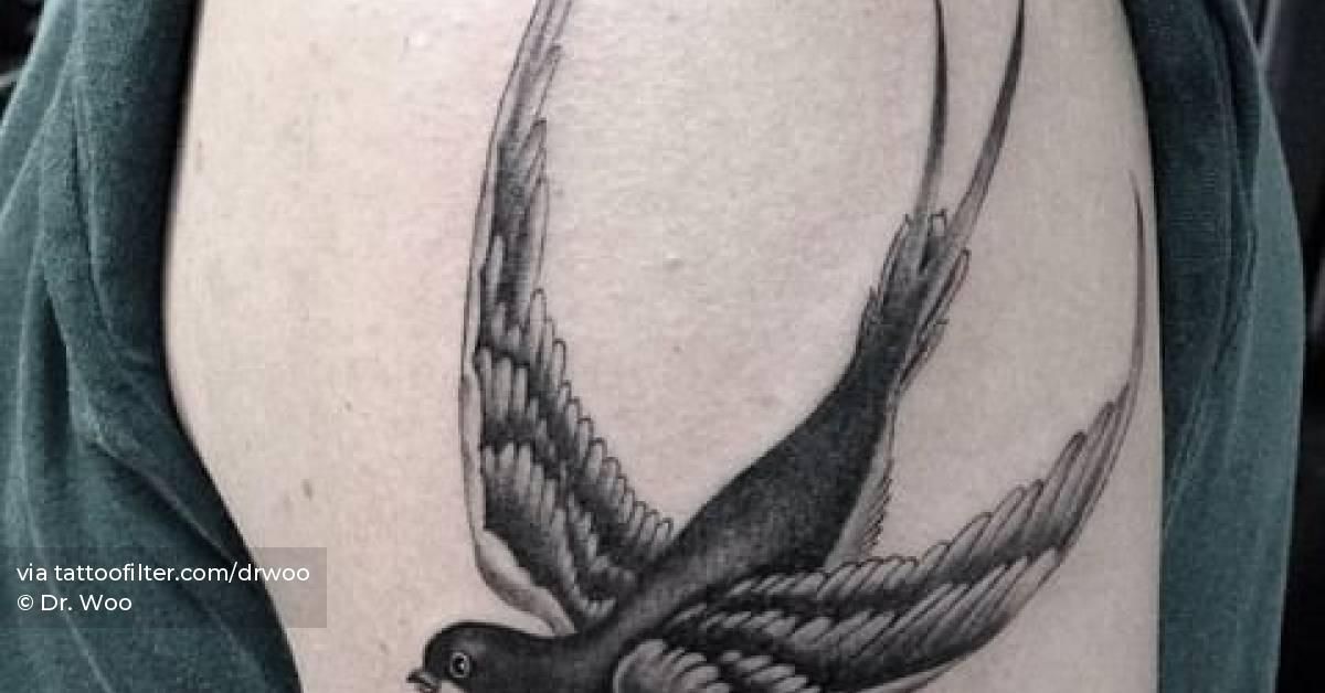Swallow tattoo done on the upper arm.