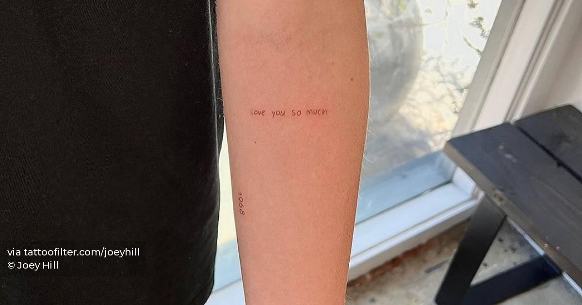 "Love you so much" lettering tattoo placed on the inner