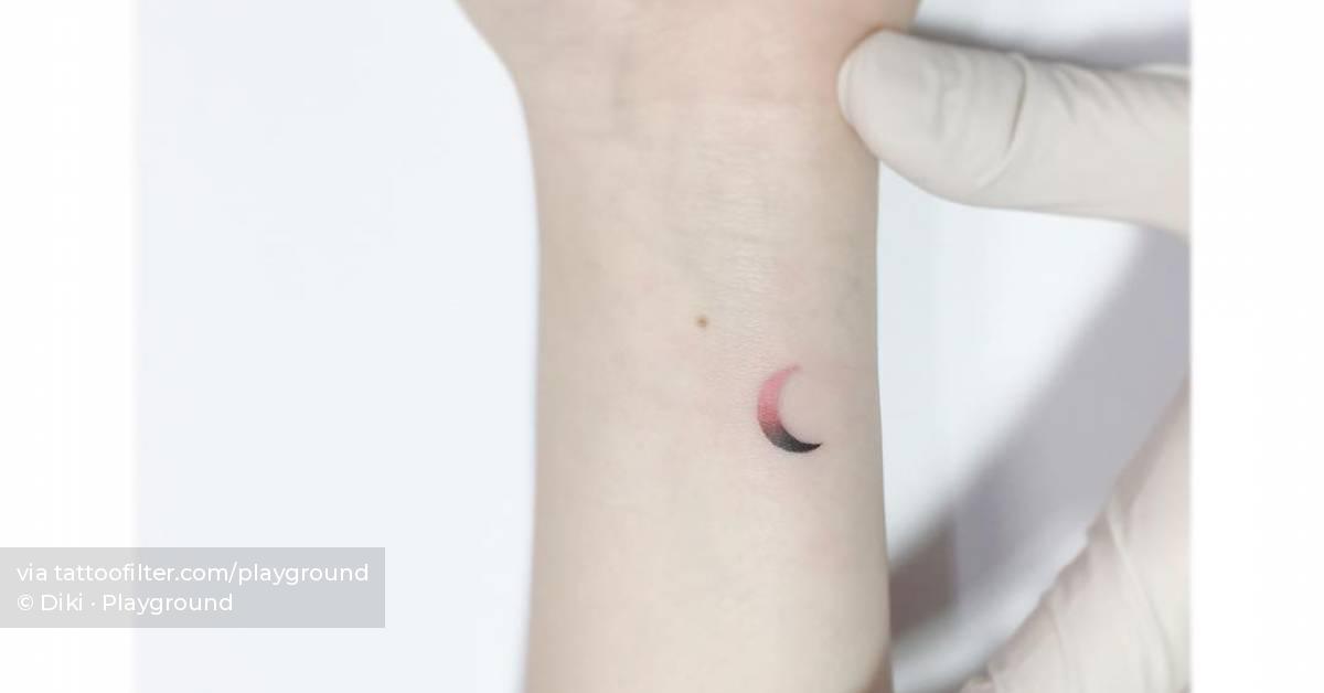 Crescent moon tattoo done on the wrist.