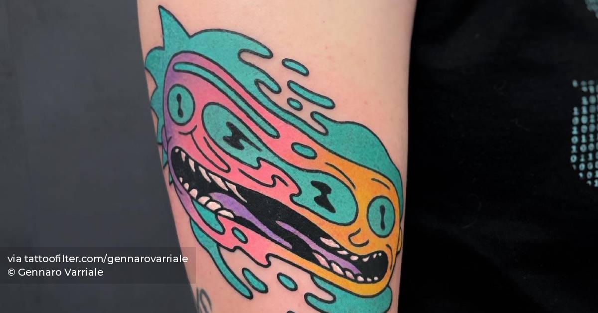 Rick & Morty tattoo located on the upper arm.