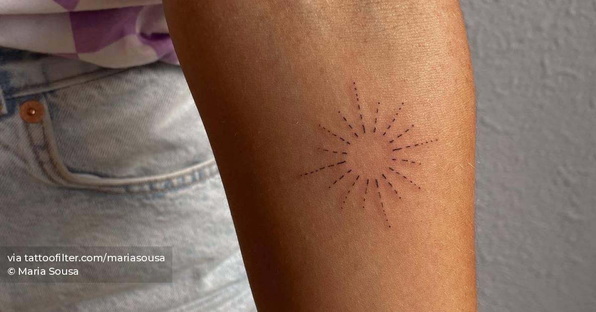 Fine line sun and unalome tattoos located on the inner