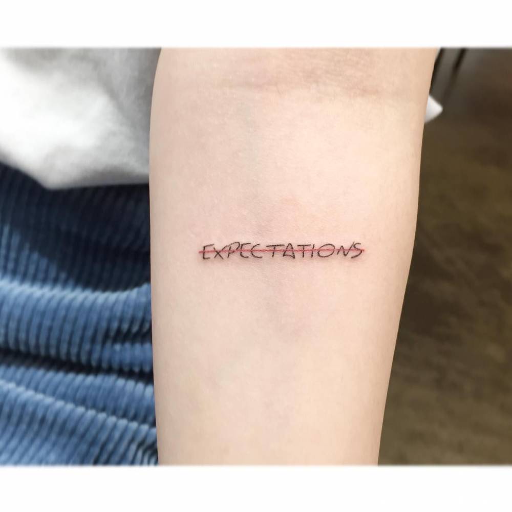  No Expectations Lettering Tattoo Done On The Inner