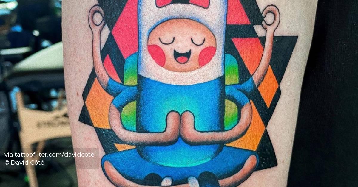 Meditating Finn the Human tattoo placed on the upper