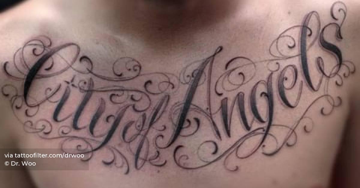 "City of angels" lettering tattoo placed across the