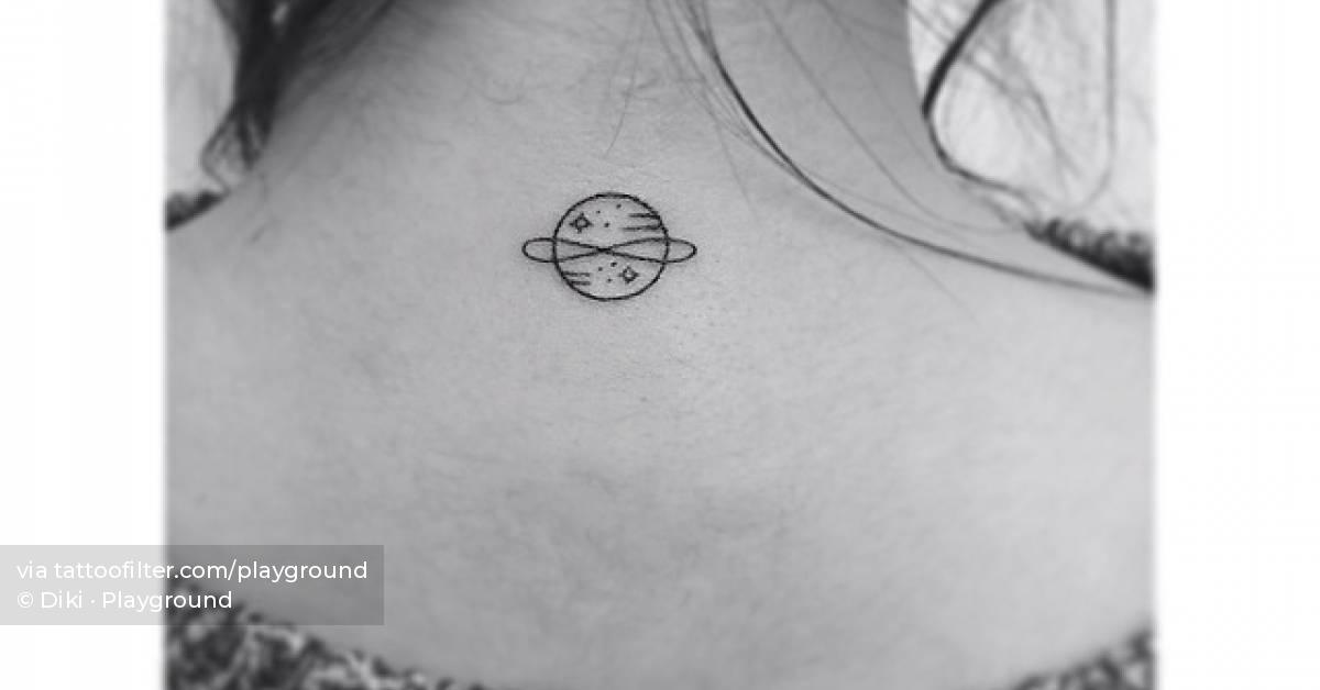 Minimalistic infinity Saturn tattoo located on the