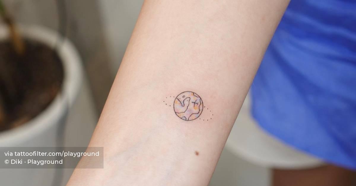 Minimalistic around the world tattoo located on the