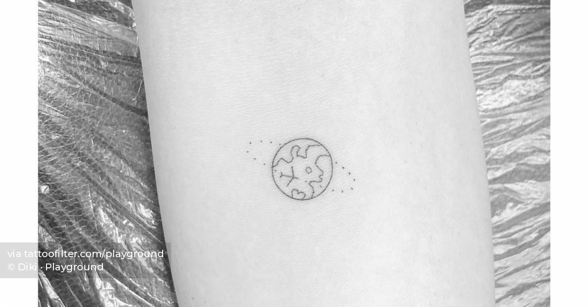 Minimalistic around the world tattoo located on the