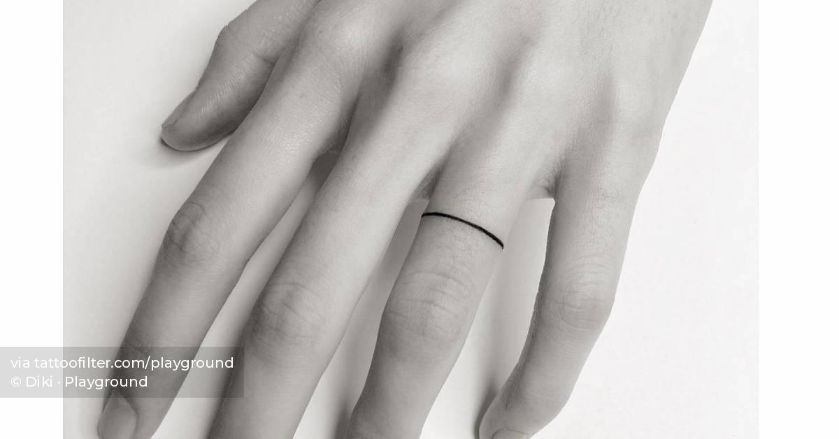Minimalistic style ring tattoo.