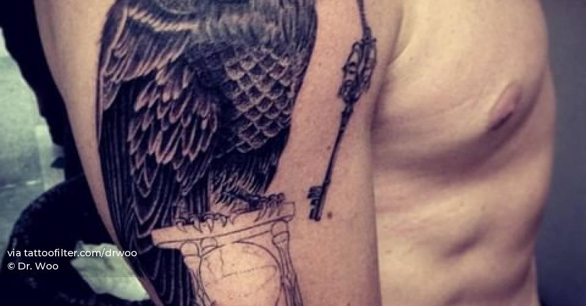 Crow tattoo located on the upper arm.