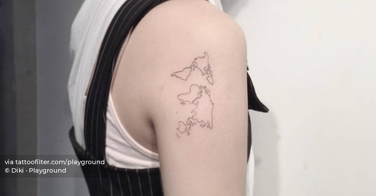 FIne line world map tattoo done on the upper arm.