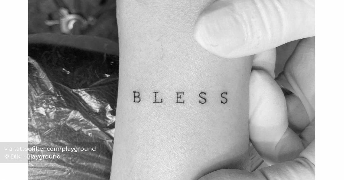 Tattoo of the word "bless" located on the wrist.