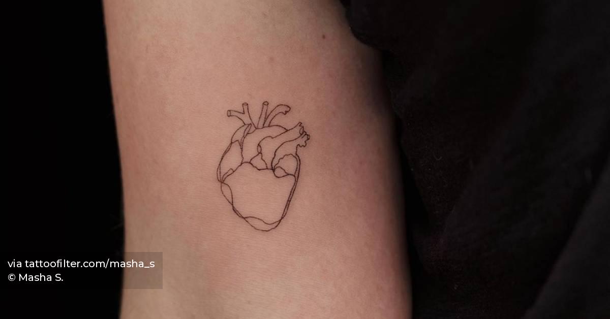 Fine line anatomical heart tattoo located on the inner
