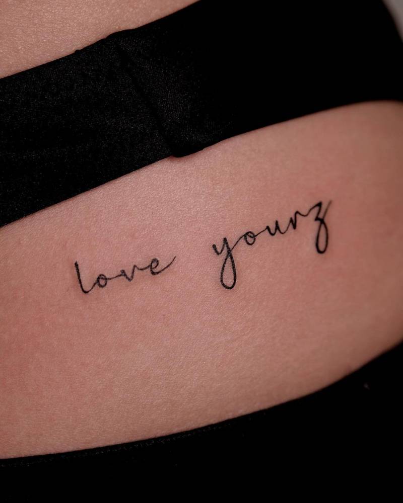  Love Yourz Lettering Tattoo Located On The Hip 