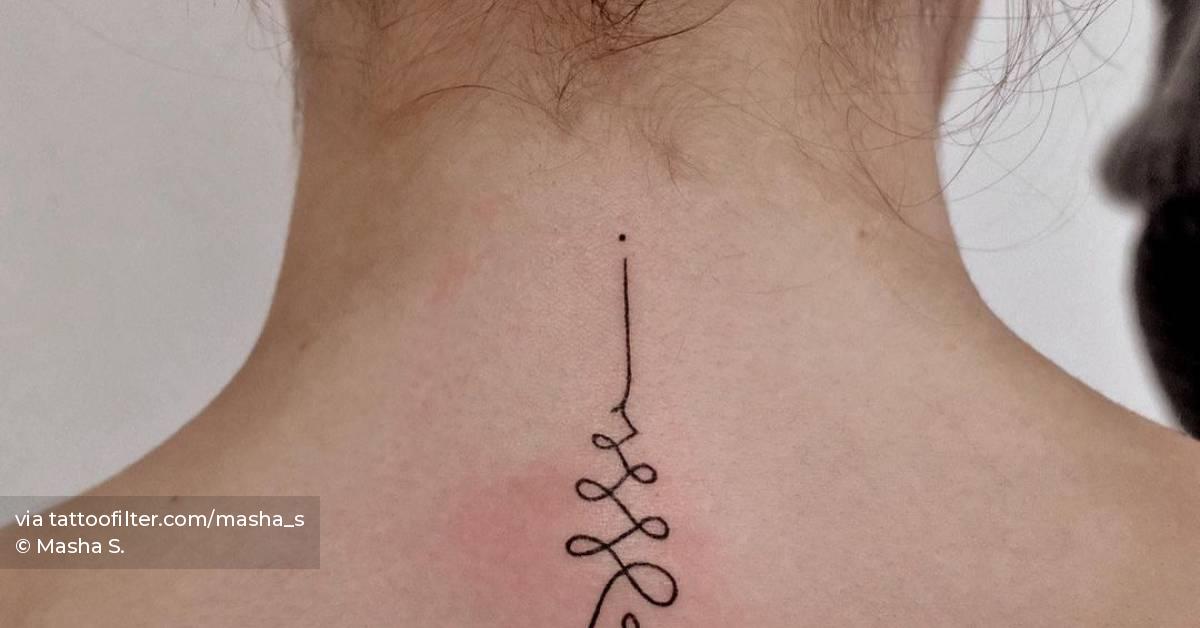 Minimalistic style Unalome tattoo done on the upper