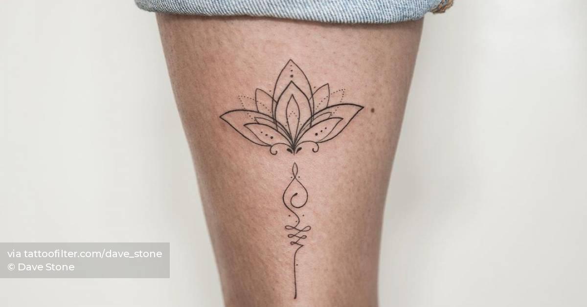 Fine line lotus unalome tattoo on the achilles.