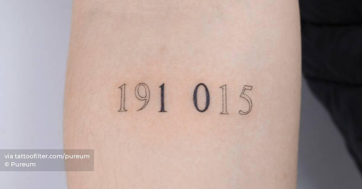 Numbers tattooed on the inner forearm.
