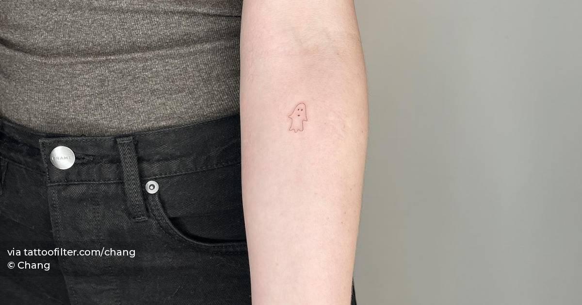 Minimalist ghost tattoo done on the inner forearm, fine