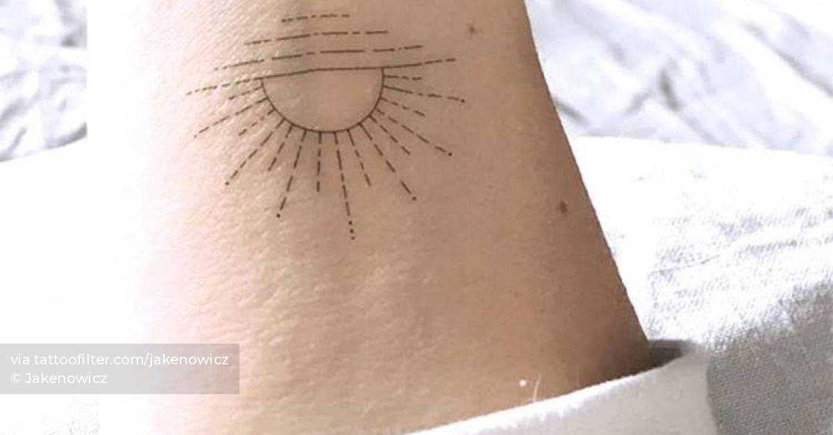 Small fine line sunset temporary tattoo designed by