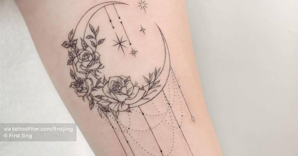 Moon roses tattoo on inner forearm
