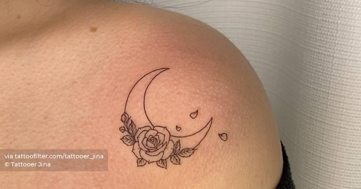 Fine line flower moon tattoo on the shoulder