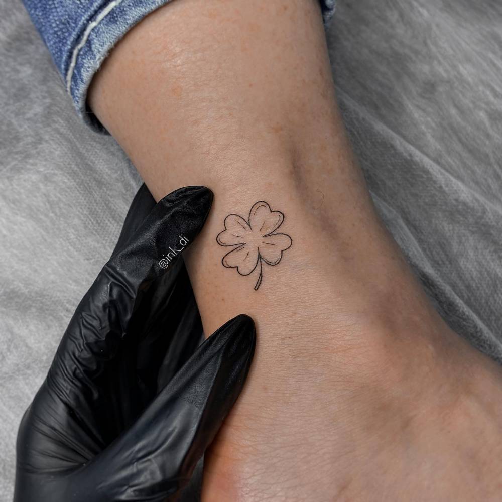 Fine Line Four Leaf Clover Tattooed On The Ankle 