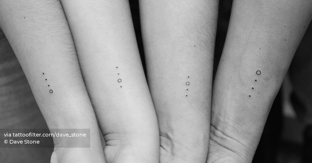 Matching minimalistic tattoo for siblings.
