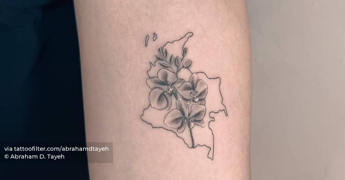 Colombia Map and orchids tattoo located on the inner