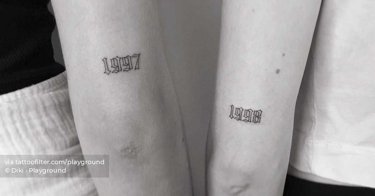 Matching "1997" and "1998" lettering tattoos for best