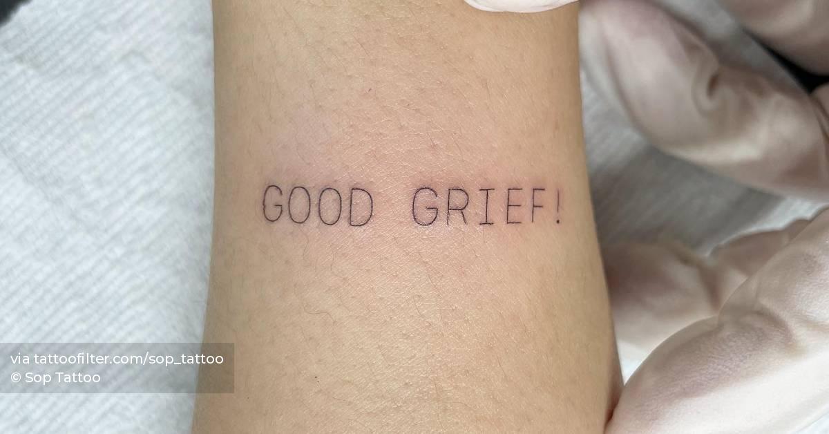 "Good grief" lettering tattoo handwritten on the wrist.