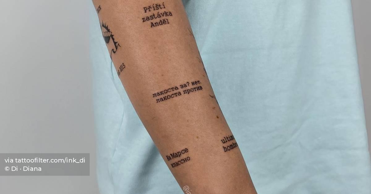Czech and russian quotes tattooed on the forearm.